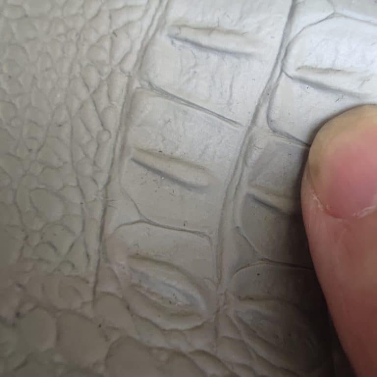 PVC leather stocklot is polyester based fabric laminated with pvc film